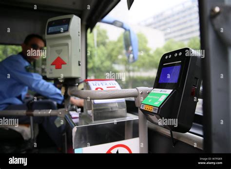 A POS Machines For Passengers To Scan The Riding QR Codes Of Bus Fare Payment Though WeChat Pay