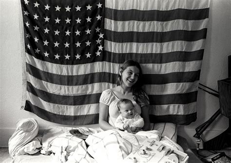 Photo Of Leonardo DiCaprio As A Baby With His Mother In Note That The Flag Behind Them Is