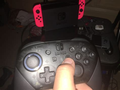 you can turn on your docked switch remotely by pressing the home button