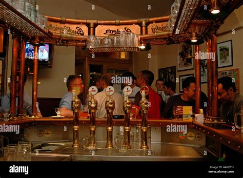 People Drinking Beer In U Medvidku Bar At Na Perstyne 7 Stare Mesto