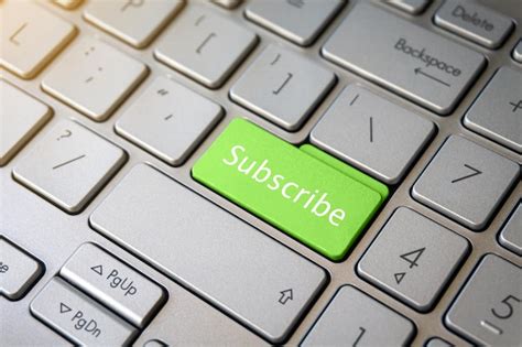 Premium Photo Green Subscribe Button On Keyboard