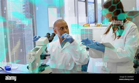 image of medical data processing on diverse male and female scientists