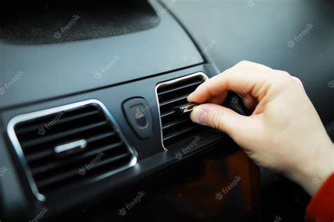 Premium Photo The Process Of Choosing Climate Control In The Car