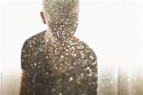 Double Exposure Of A Woman And Gold Glitter By Stocksy Contributor