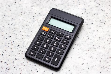 Premium Photo Black Calculator On White Counter Office Equipment