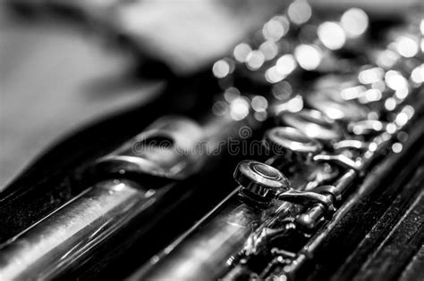 A Black And White Close Up Of A Valve Of A Disassembled Silver Metal