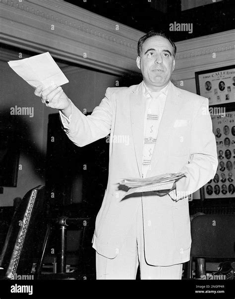 Sen Henry B Gonzalez Of San Antonio Texas Holds Up A Stack Of