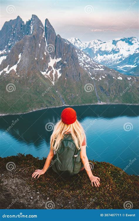 Woman Hiking Solo Traveling In Norway Female Tourist With Backpack