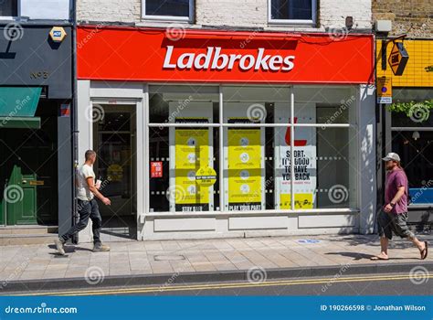 Ladbrokes Betting Shop In Widmore Road Bromley With Pedestrians