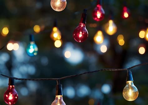 Premium Photo Numerous Colored Festive String Lights Hanging Taut In A Backyard Setting