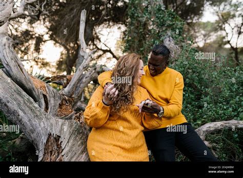 Couple Holding Hands Around Tree Hi Res Stock Photography And Images Alamy
