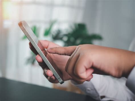 Human Hand Holding A Smartphone Showing Communication Technology Concept Stock Image Image Of