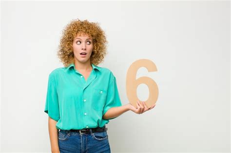 Premium Photo Portrait Of A Woman On A Grey Background