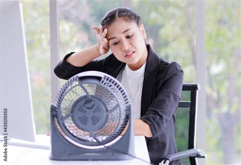 Asian Female Secretary Feeling Suffer Tired And Hot In Summer Use Hand