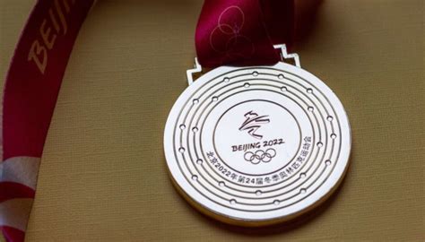 Пекін 2022 як виглядають олімпійські медалі