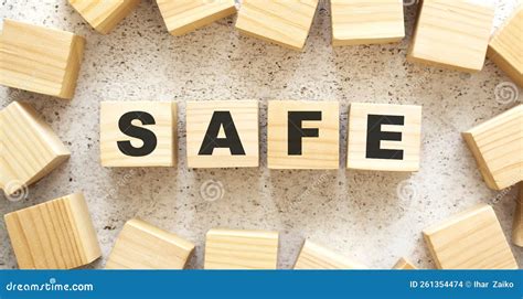 The Word Safe Consists Of Wooden Cubes With Letters Top View On A