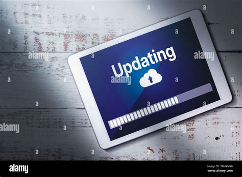Top View Of Digital Tablet Updating Software Screen System Engineer And Programming Software