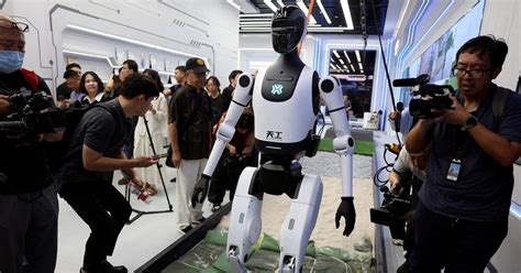 Chinas New Robot Store Sells Butlers Musicians And Even Einstein