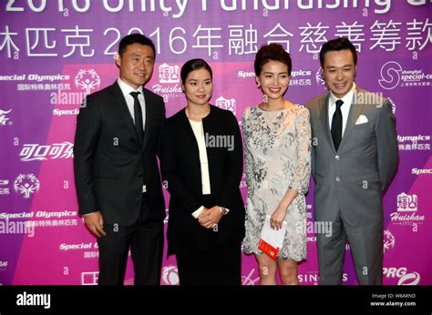 Pregnant Chinese Tennis Star Li Na Second Left And Her Husband Jiang Shan Left Pose With