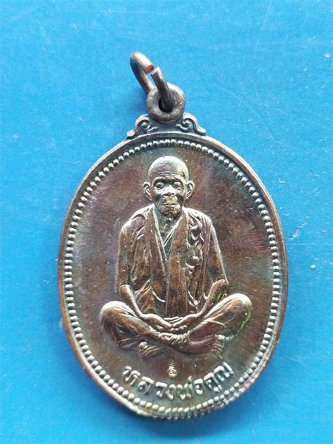 เหรียญรูปไข่ หลวงพ่อคูณ รุ่นคุณพระเทพประทานพร สร้างปี ๒๕๓๖ Ennxo
