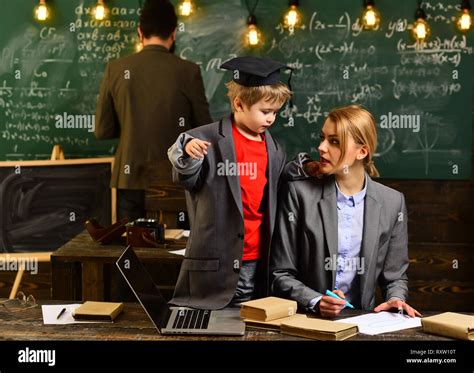 Babe Writing Composition For Annual Exams Preparation Friendly Teacher And Adult Smiling