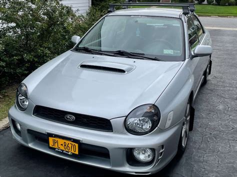 2002 Subaru Impreza With 17x7 48 Work Emotion Xt7 And 21545r17