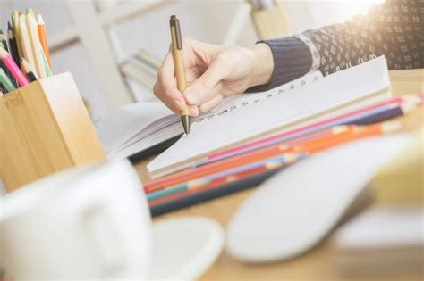 Premium Photo Businesswoman Writing In Notepad