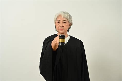 Premium Photo Strict Senior Female Judge Dressed In Robe Gown Uniform
