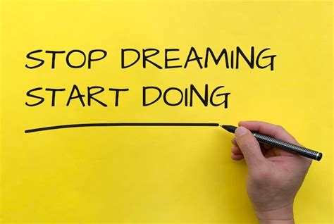 Premium Photo Stop Dreaming Start Doing Text On Yellow Background
