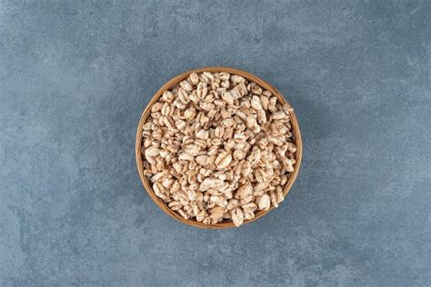 Free Photo Small Bowl Of Flakes On Marble