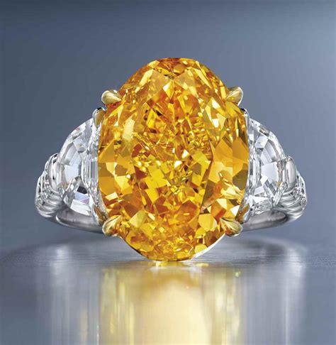 A RARE COLORED DIAMOND AND DIAMOND RING Christie S
