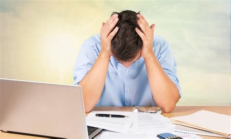 Premium Photo Man Calculating His Bills Premium Photo Man Calculating His Bills