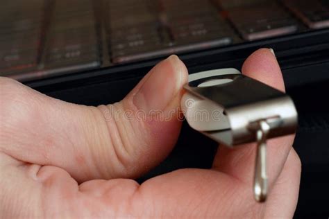 Person Is Inserting A USB Stick In A Laptop Computer Usb Flash Memory And Computer Stock Photo