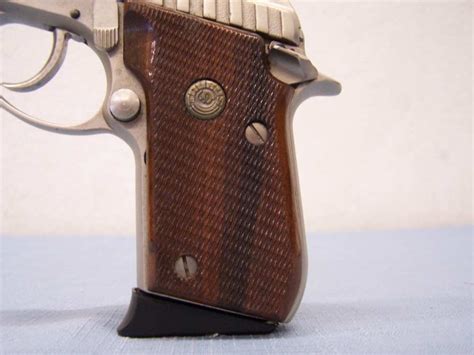 Taurus Pt 22 22lr Pistol Nickel Finish Wood Grips Tip Up Barrel