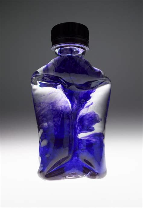 Plastic Bottle Containers With Food Colouring Mixing Creating Unique