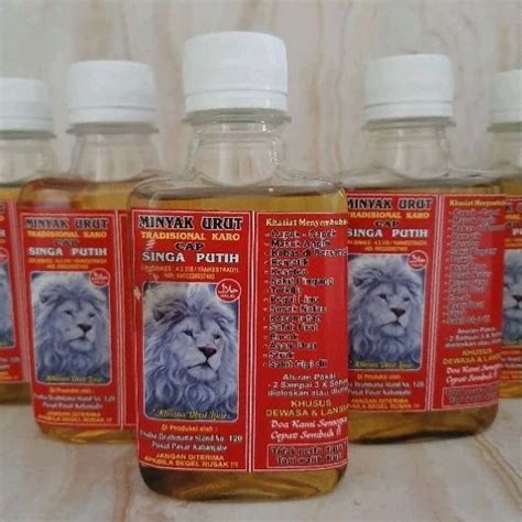 Jual Minyak Karo Cap Singa Putih Minyak Urut Tradisional Karo Cap