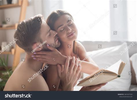 Sexy Woman Holding Book While Shirtless Stock Photo 1841027533 Shutterstock