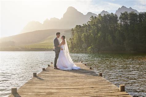 The Day Weve Been Waiting For Full Length Shot Of An Affectionate Bride And Groom Outside On