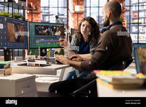 Creative Couple Working Together On Video Editing Software For Movie Making Using Ai Powered