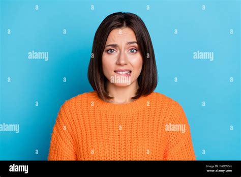 Portrait Of Attractive Unsure Uncertain Girl Biting Lip Waiting