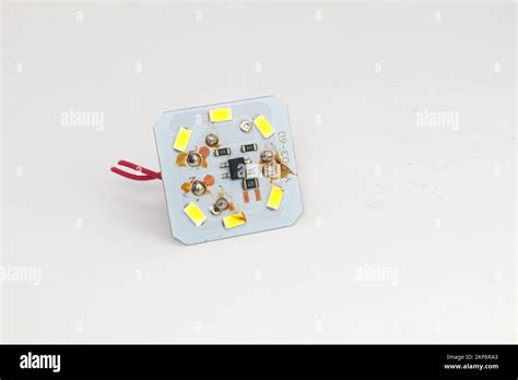 Pcb Of White Led Lamp With Resistor And Power Ic On White Background