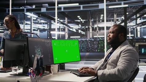 Data Center Admin Using Isolated Screen Pc To Monitor Neural Network Ai