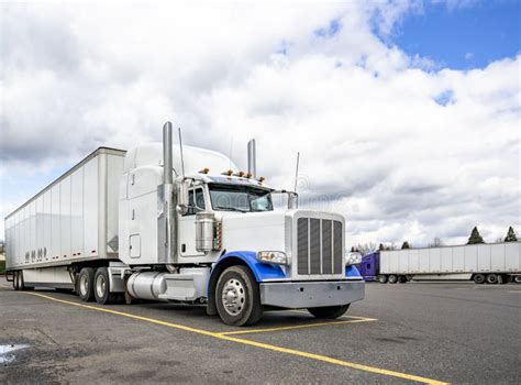 Extended Cab White Classic Big Rig Semi Truck Tractor Transporting