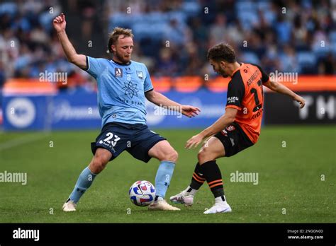 Rhyan Grant Of Sydney Fc And Carlo Armiento Of Brisbane Roar During The