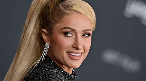 Paris Hilton Looks Phenomenal In Low Cut Sequin Swimsuit In Jaw