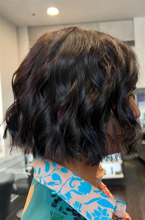 Glossy Black Wavy French Bob For Thick Hair And Sophisticated Look