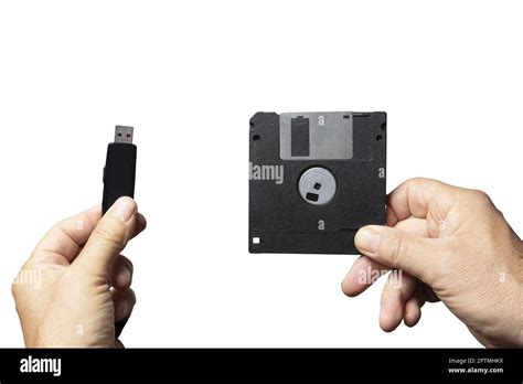 The Comparison Between An Old Floppy Disk And A USB Key For Data Storage Stock Photo Alamy