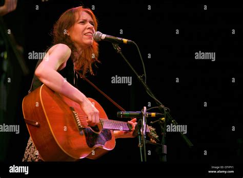 Gillian Welch Performing With Supporting Vocals And Guitar By David