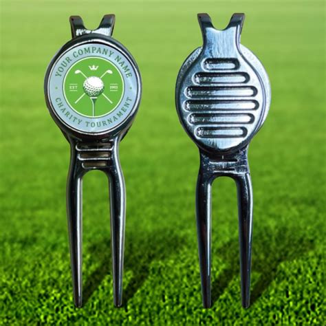 The Essex Silver Divot Tool With Belt Clip And Removable Ball Marker