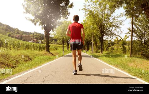 Back View Man Running Outdoor Stock Photo Alamy